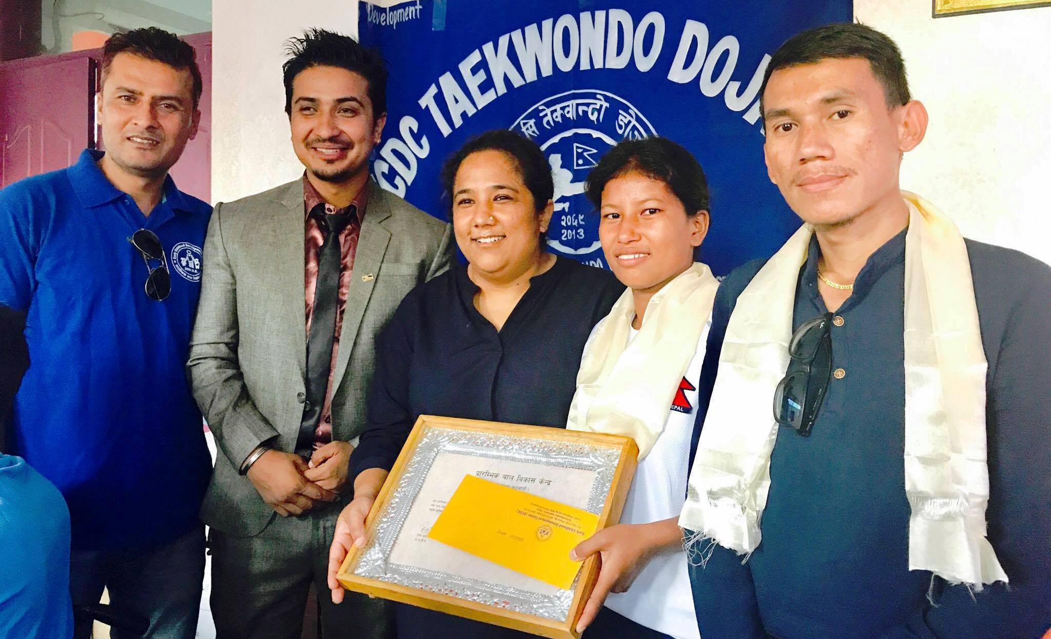 Medalists Dhami and coach Lama felicitated - HamroKhelkud